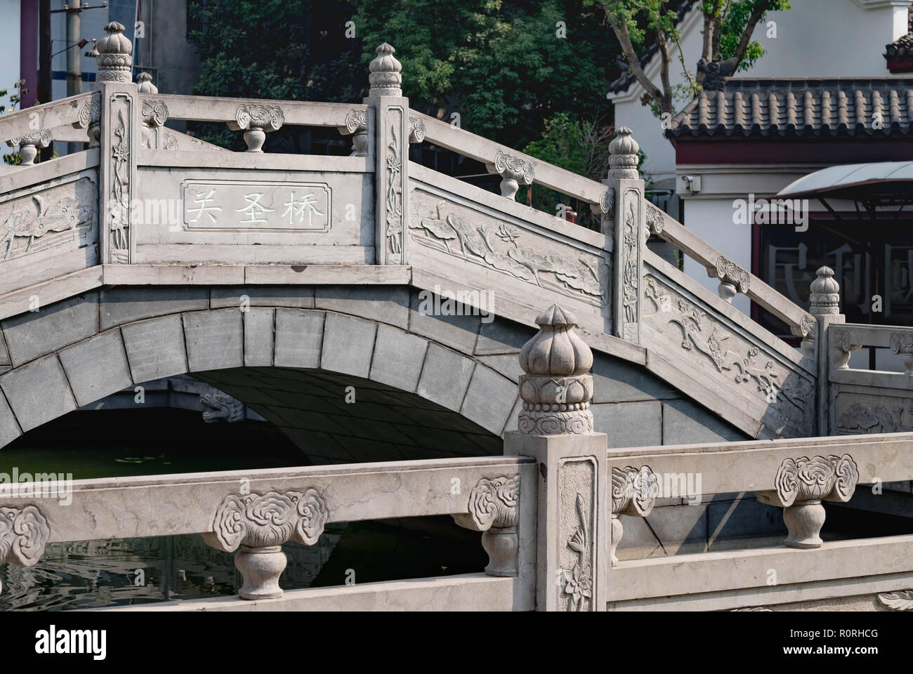 Arch bridge in park of china Stock Photo - Alamy