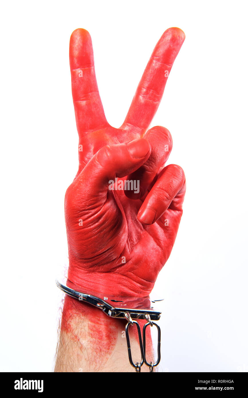 Caught red handed - hand painted red wearing handcuffs concept Stock ...
