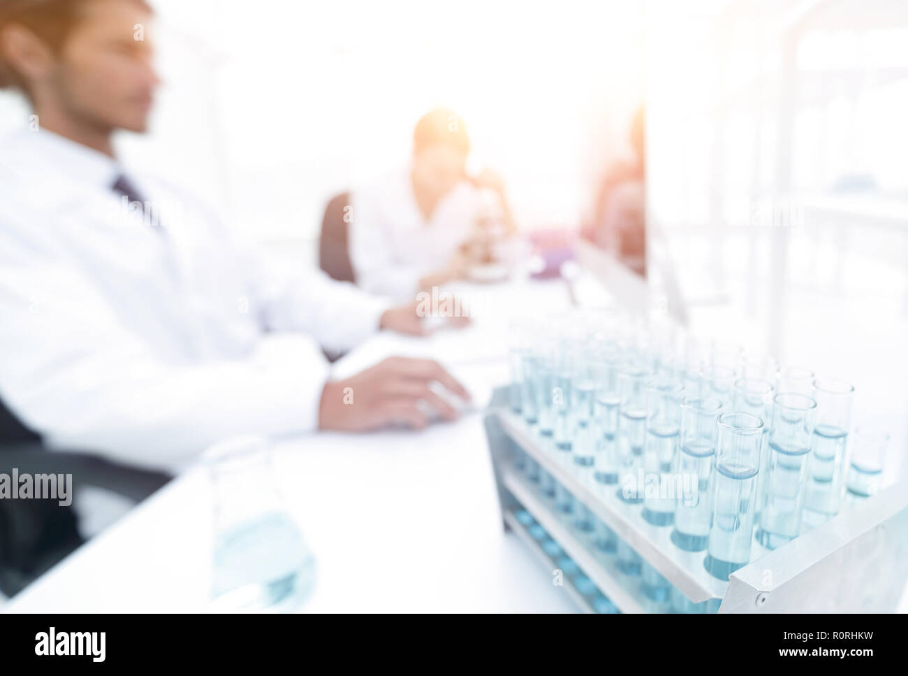 side view of scientists working in laboratory Stock Photo - Alamy