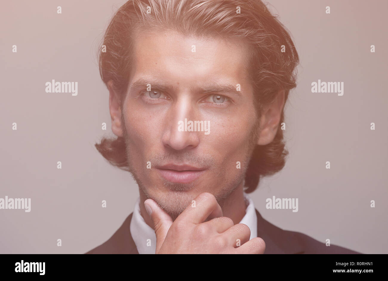 face of confident young businessman Stock Photo - Alamy
