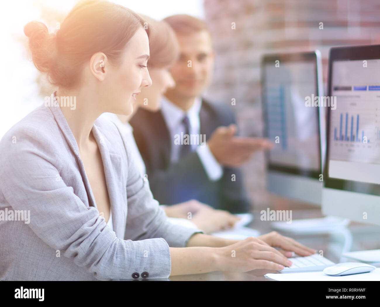 business team discussing financial charts on a workplace Stock Photo ...