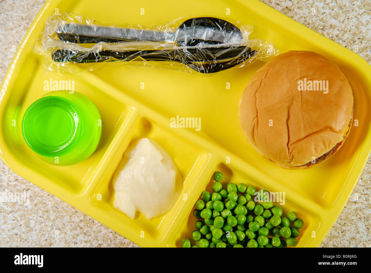 Elementary school lunch cheeseburger with mashed potatoes gelatin and ...