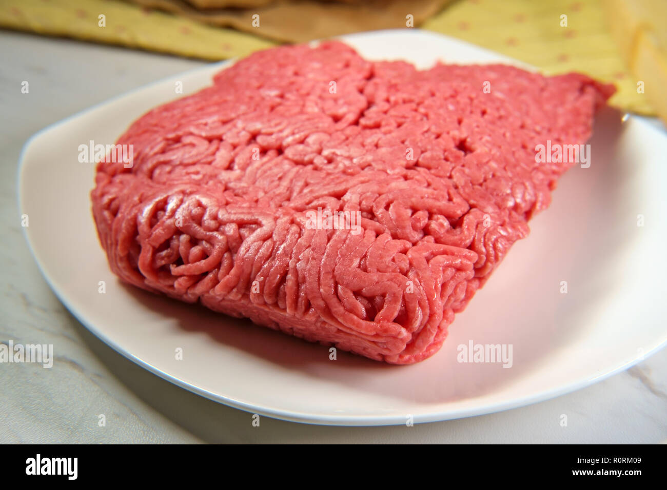 Ground beef meat for chili con carne recipe Stock Photo - Alamy