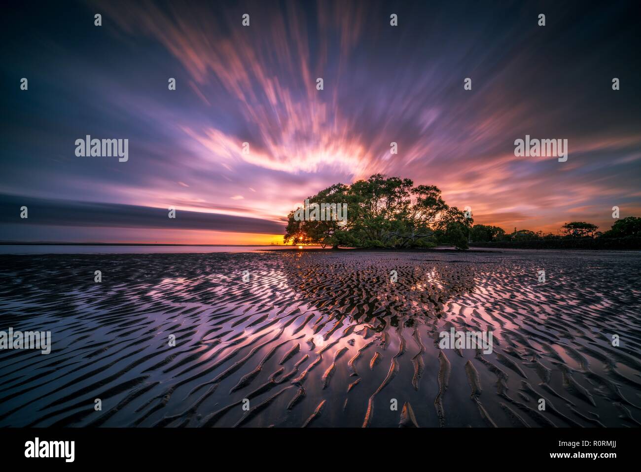DAWN ON THE BEACH Stock Photo - Alamy