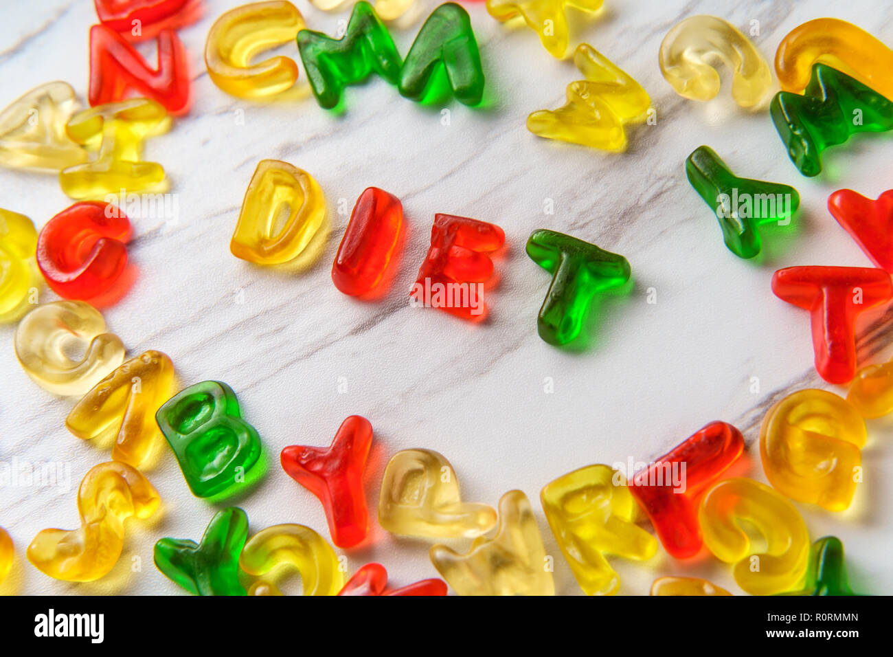 Assorted colorful gummy candy letters spell the word Diet Stock Photo ...