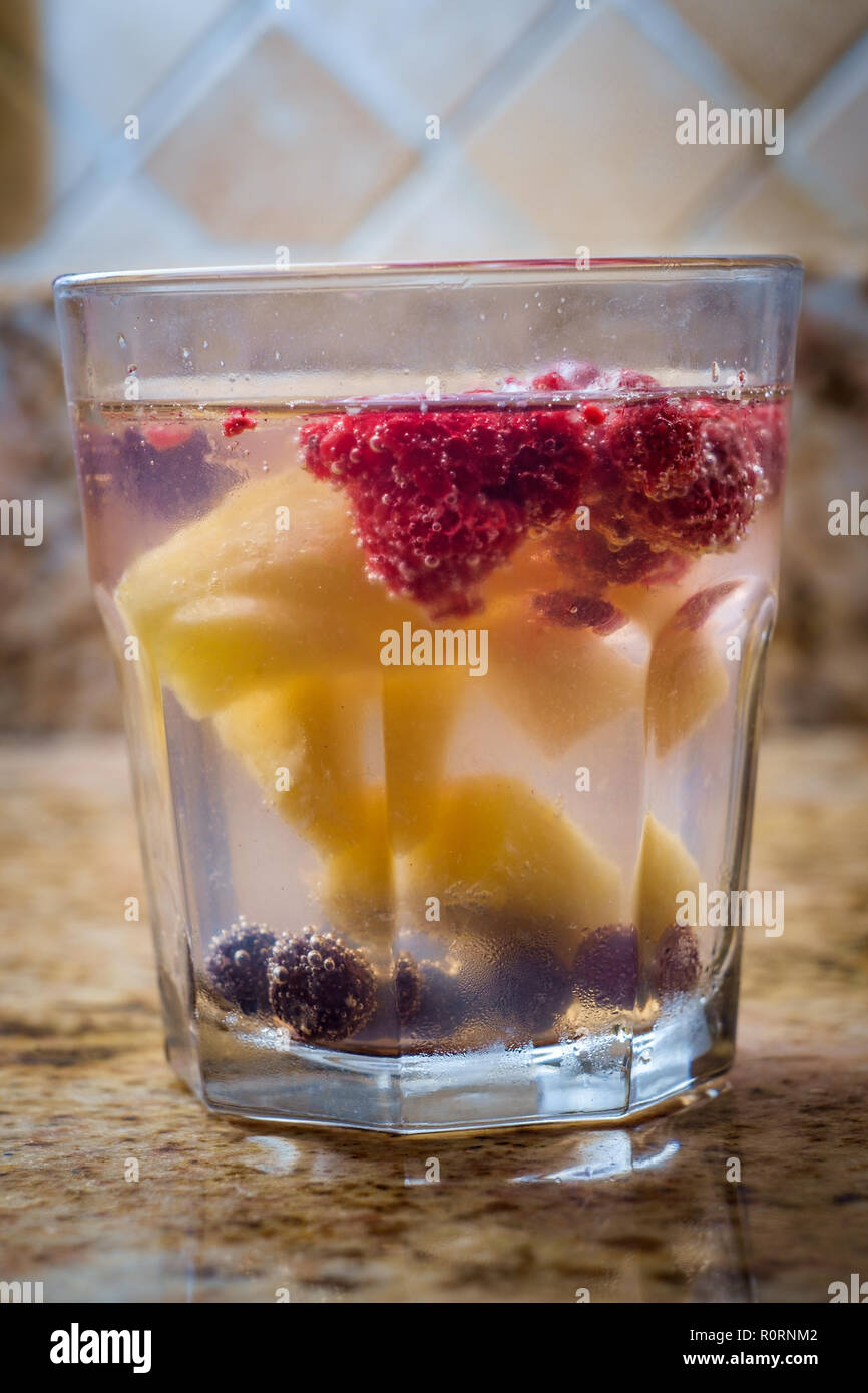 Fruit infused seltzer sparkling water with raspberries pineapple and ...