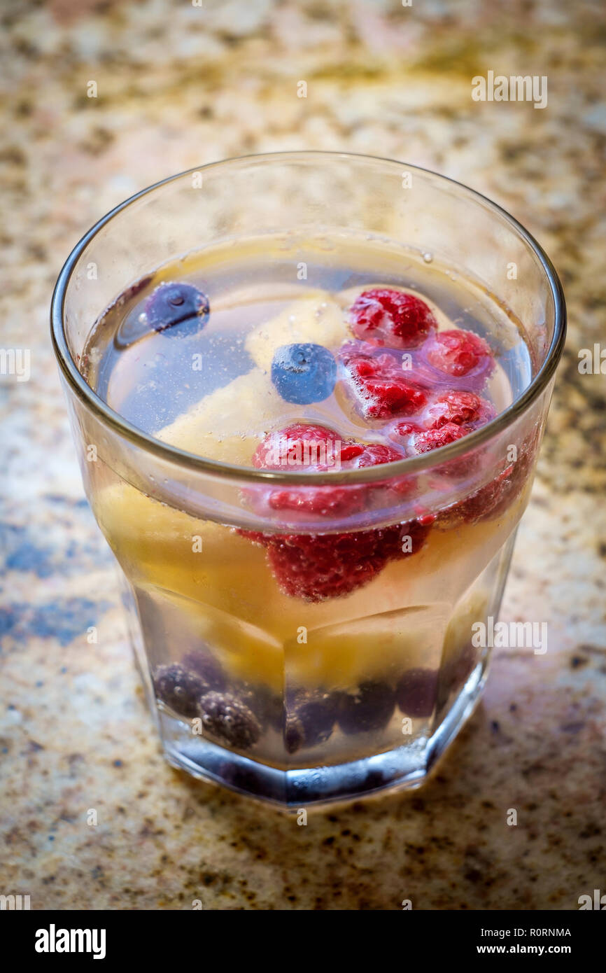 Fruit infused seltzer sparkling water with raspberries pineapple and ...