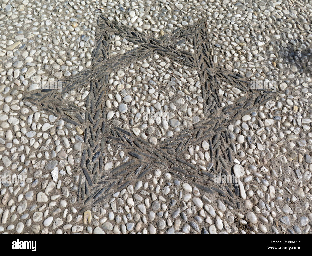 Pebble mosaic in square in Jewish quarter of Granada, Andalusia Stock ...