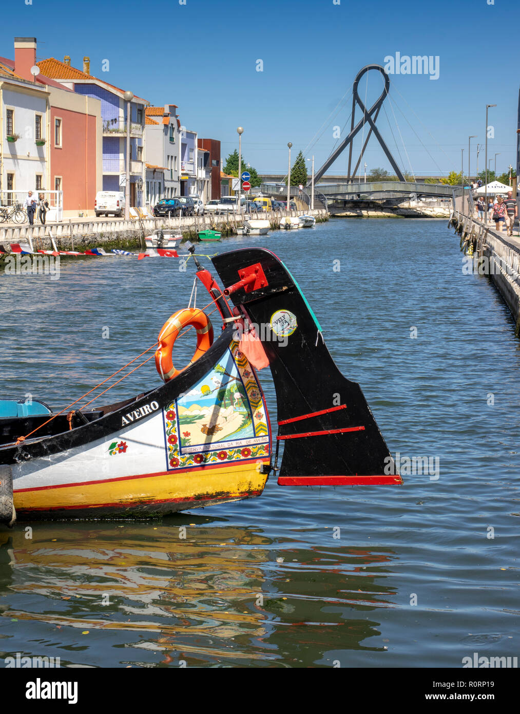 'Moliceiro' (traditional boat) on canal, Aveiro. Beira Litoral ...
