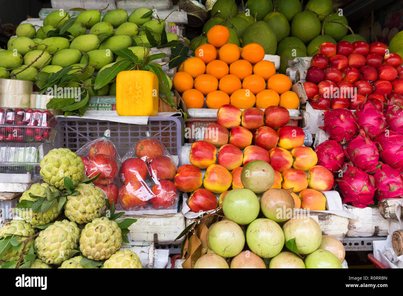 Tropical fruit stall in an East Asian market Stock Photo - Alamy