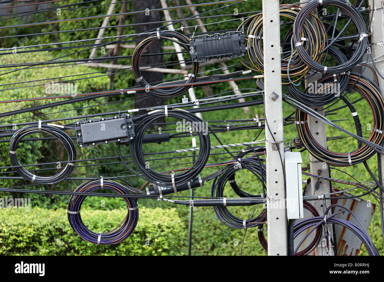Electric cables messy tangled in Bangkok, Thailand Stock Photo - Alamy