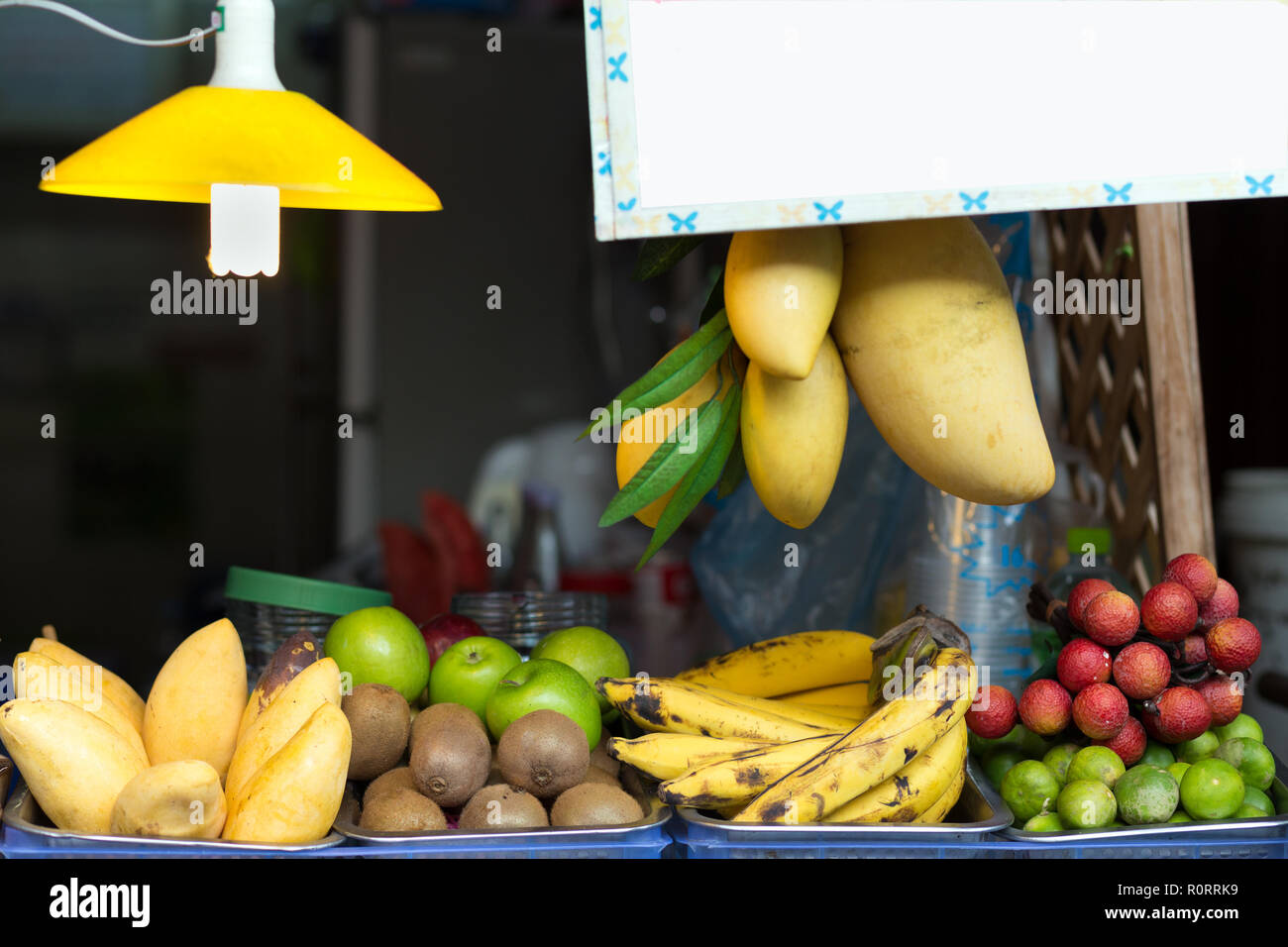 tropical fruit shop stall with blank board for editing Stock Photo - Alamy