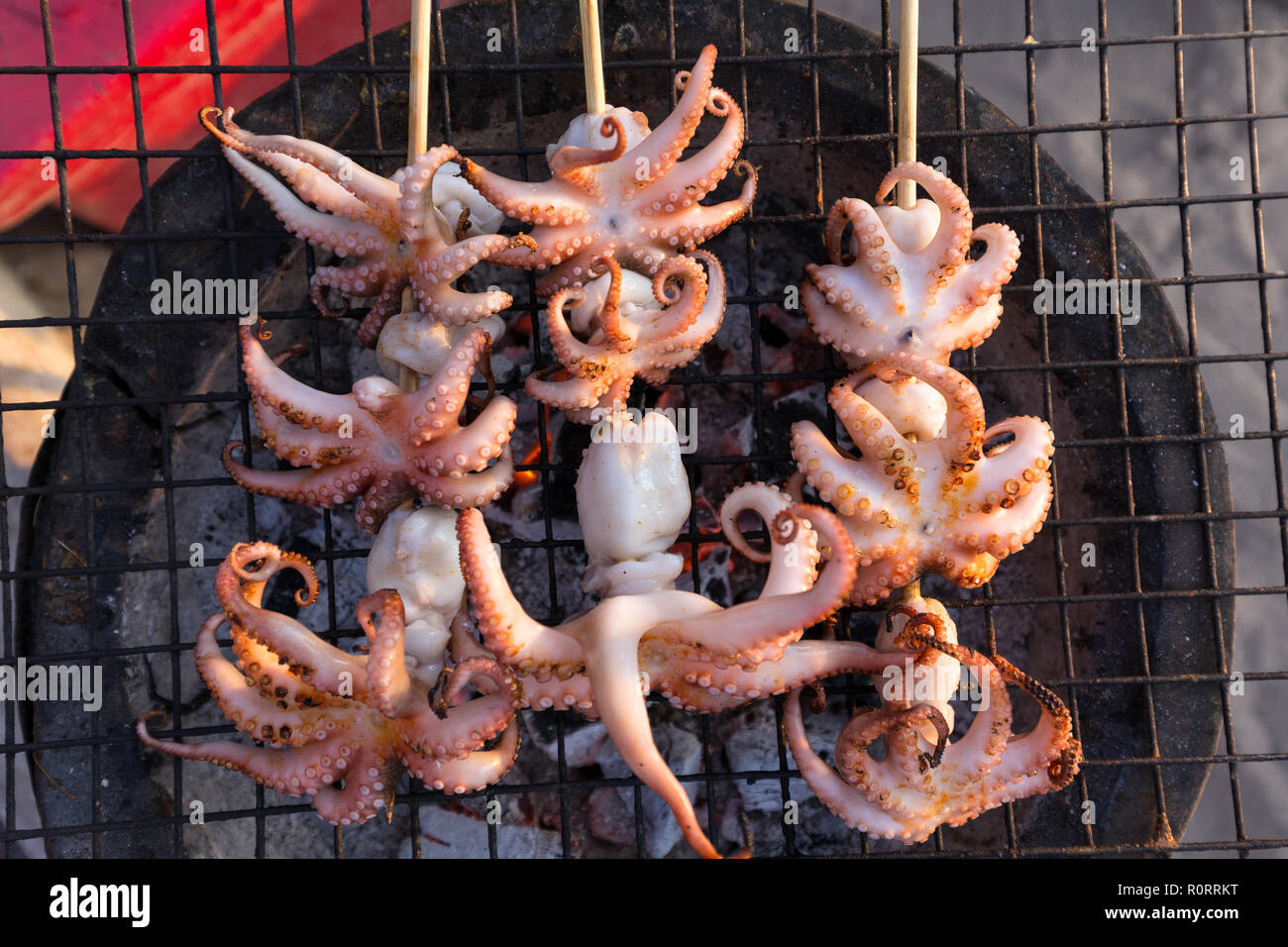 Traditional Thai Squid Barbecue on the street along the beach Stock ...