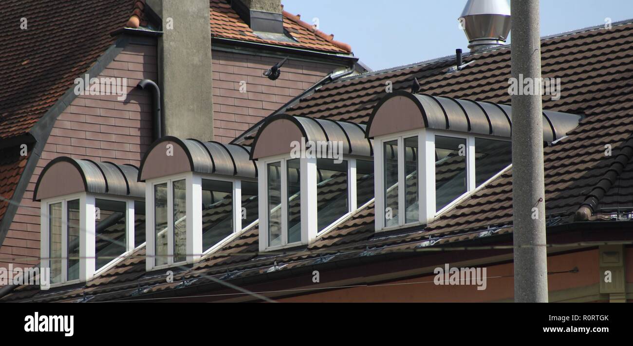 a row of roof windows Stock Photo - Alamy