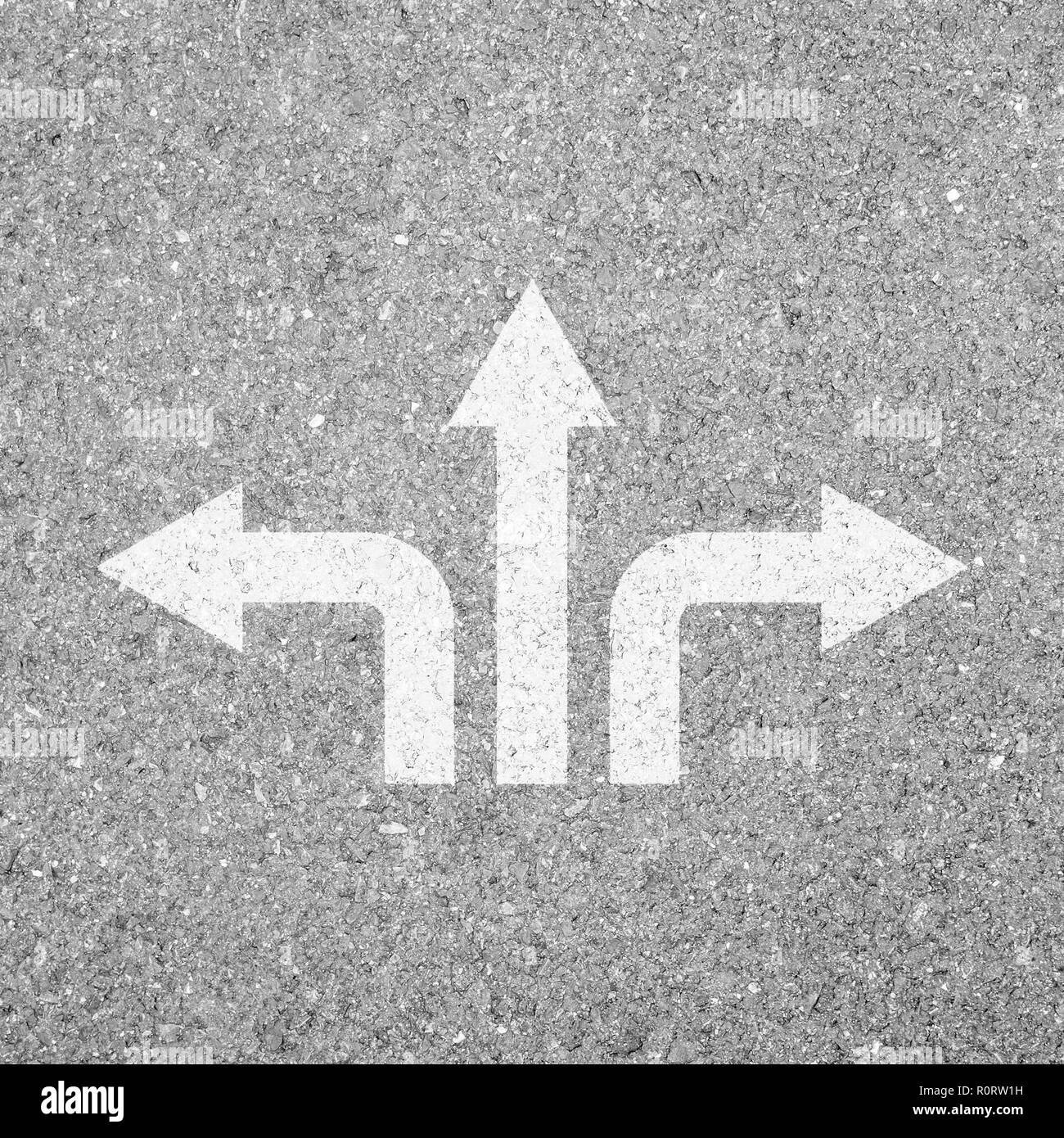 Three ways crossroad direction sign on asphalt concrete road Stock ...