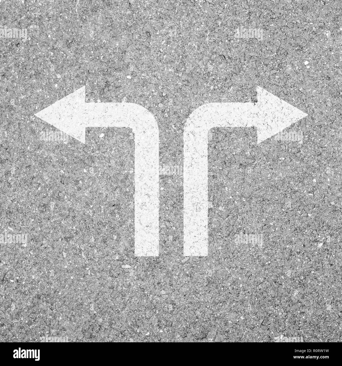 Two ways crossroad direction sign on asphalt concrete road Stock Photo ...