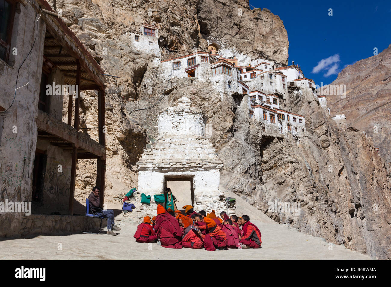Group of young Buddhist monks in front of Phugtal Gompa (also known as ...