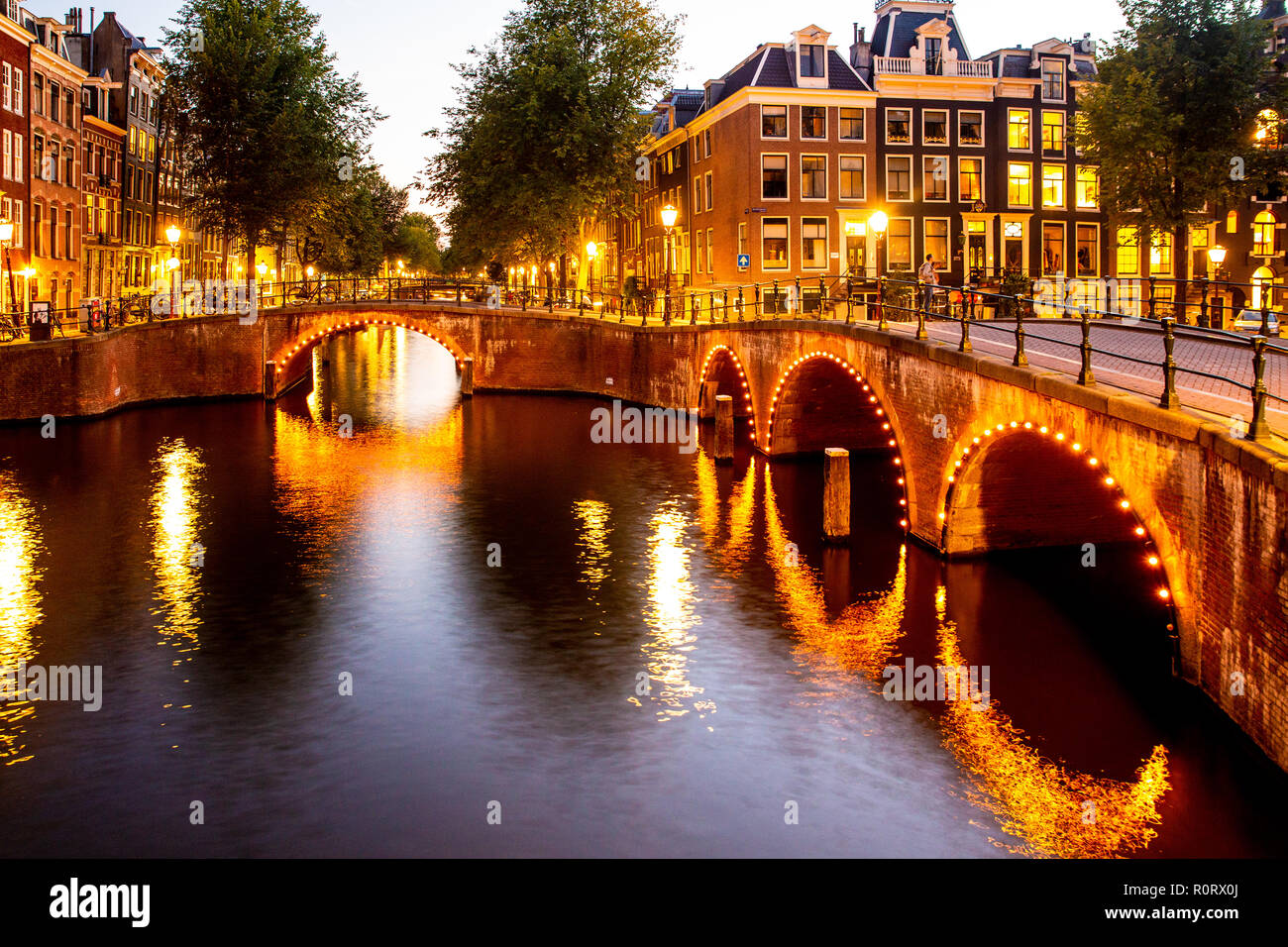 Beautiful night scene from the City of Amsterdam in the Netherlands ...