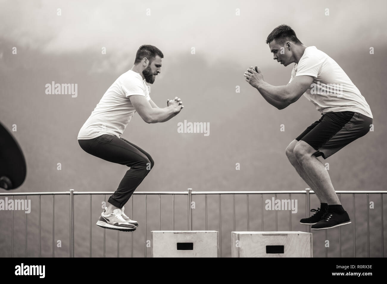 Group young friends doing jump hi-res stock photography and images - Alamy