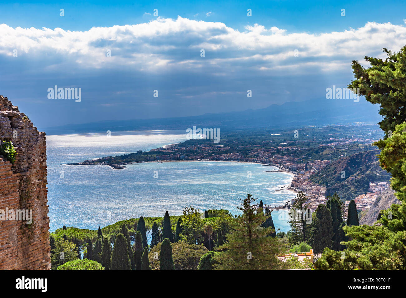 Above view of Ionian Sea coastline and Giardini Naxos town from ...