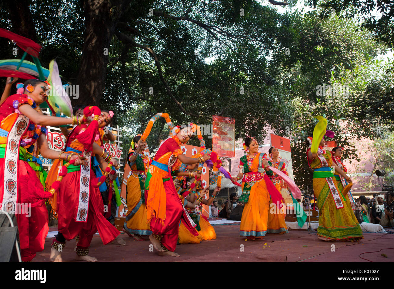 Girls dance on the stage to celebrate Basanta Utsab on Pohela Falgun ...