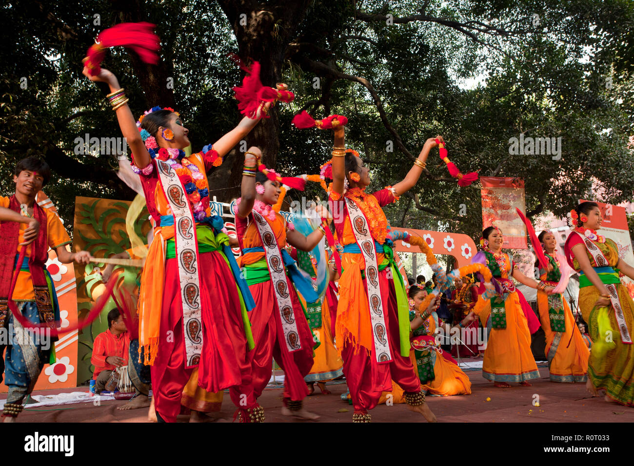 Girls dance on the stage to celebrate Basanta Utsab on Pohela Falgun ...