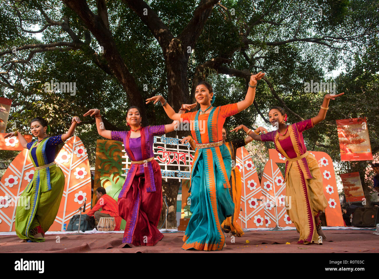 Girls dance on the stage to celebrate Basanta Utsab on Pohela Falgun ...
