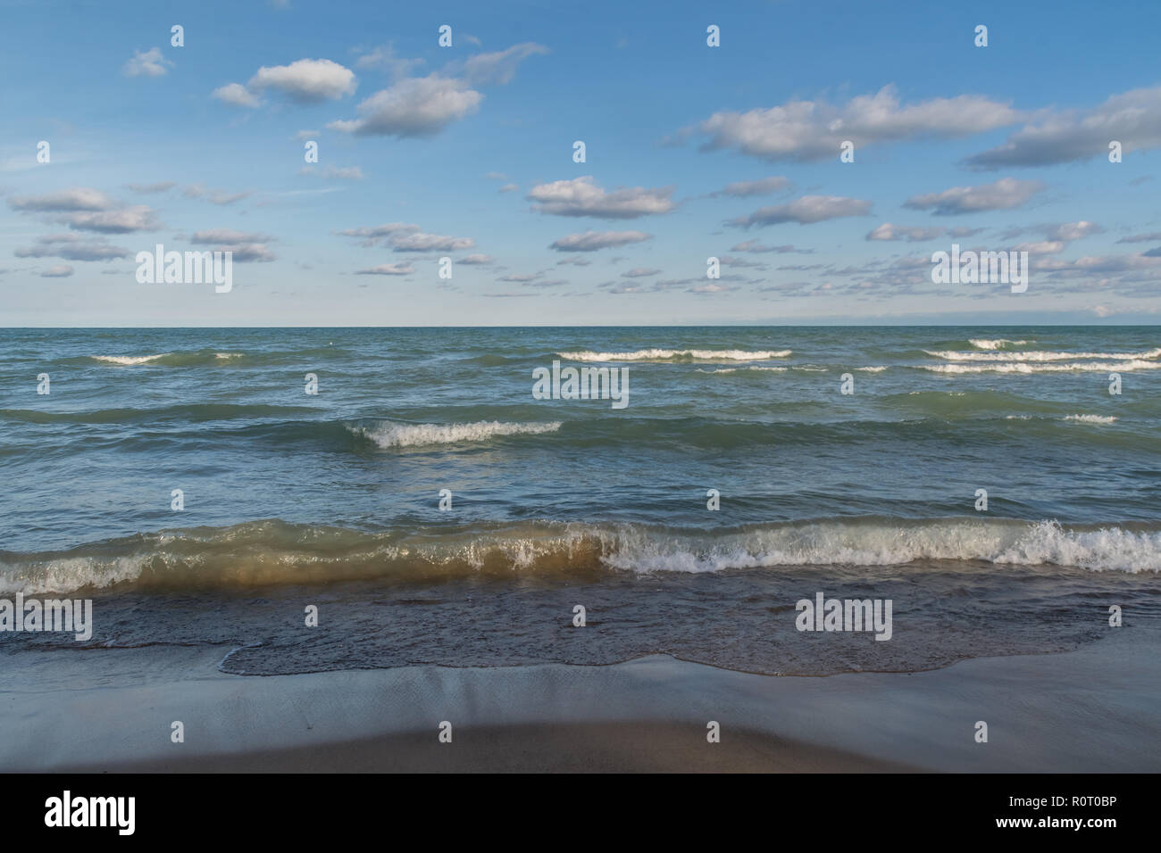 Waves crashing in on the shore of Lake Michigan. Indiana dunes state ...