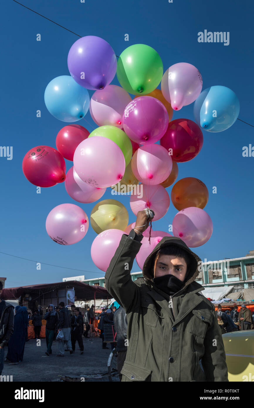Boy Selling Colourful Balloons In The Alleys The Mazar-e Sharif Central ...
