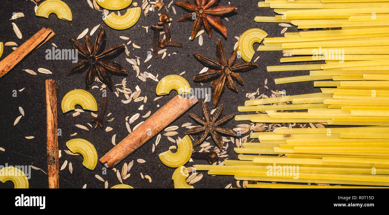 fettuccine pasta stick, macaroni, and the spices; cinnamon stick, star ...