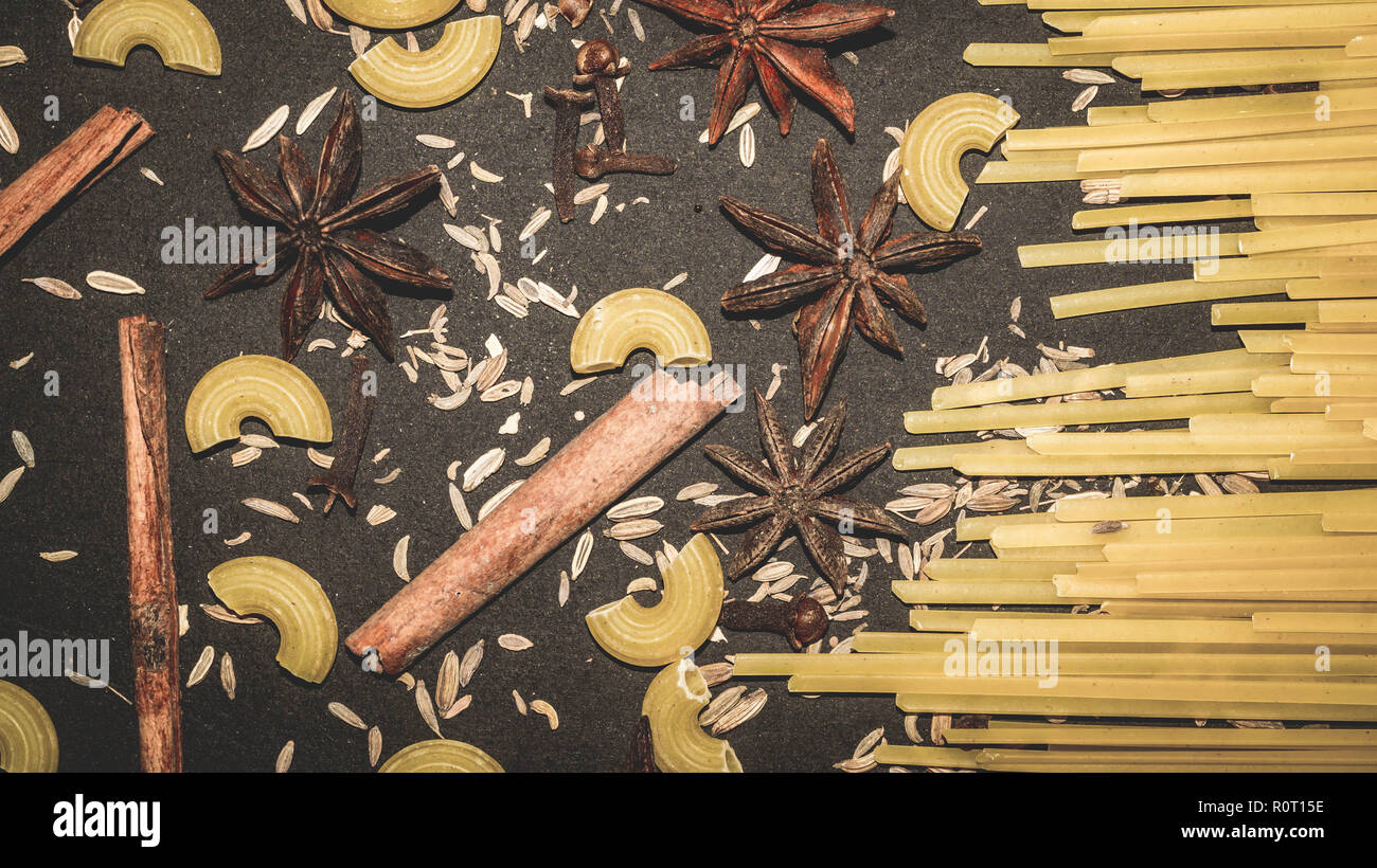 fettuccine pasta stick, macaroni, and the spices; cinnamon stick, star ...