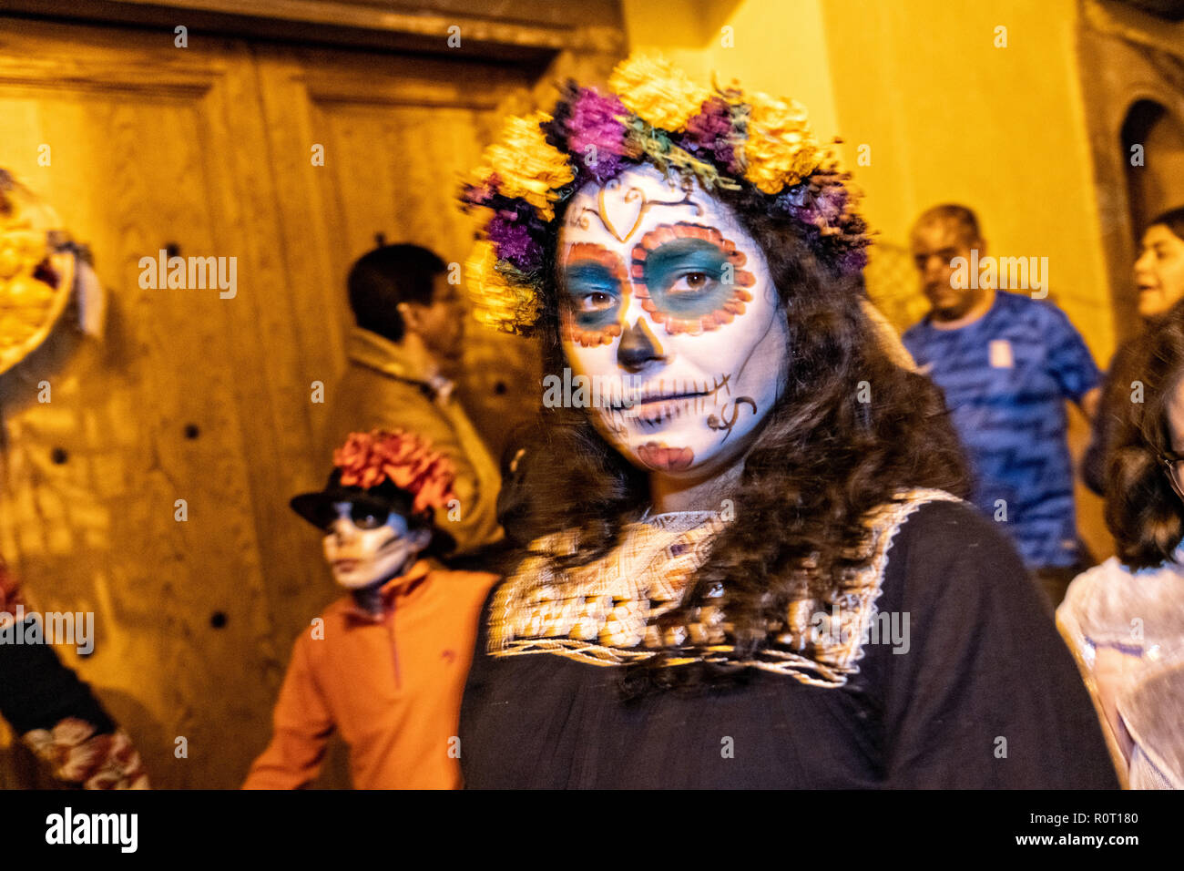 A Mexican girl wearing skeleton face paint during the Dead of the Dead ...