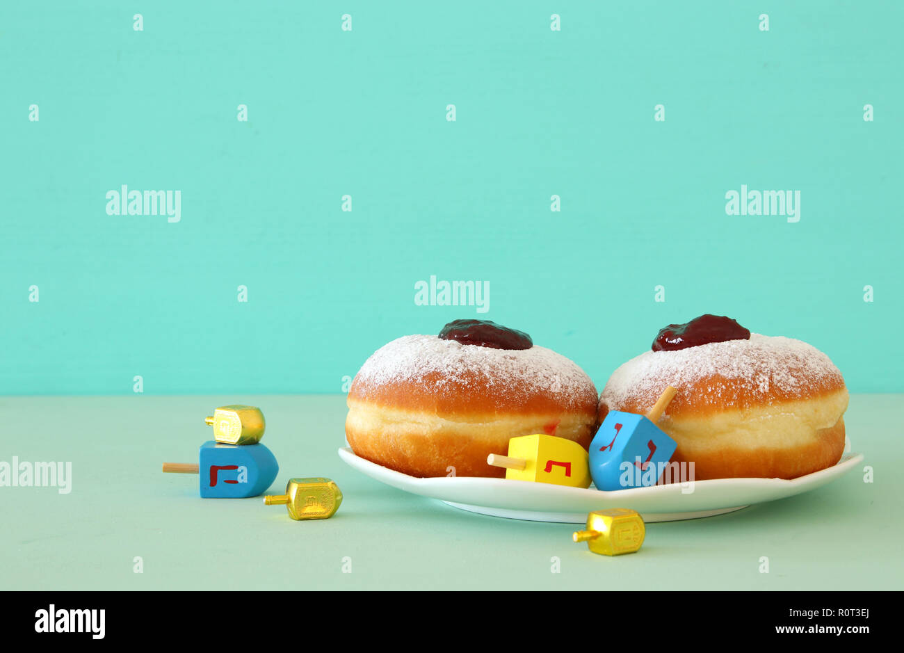 Banner of jewish holiday Hanukkah with wooden dreidels (spinning top ...