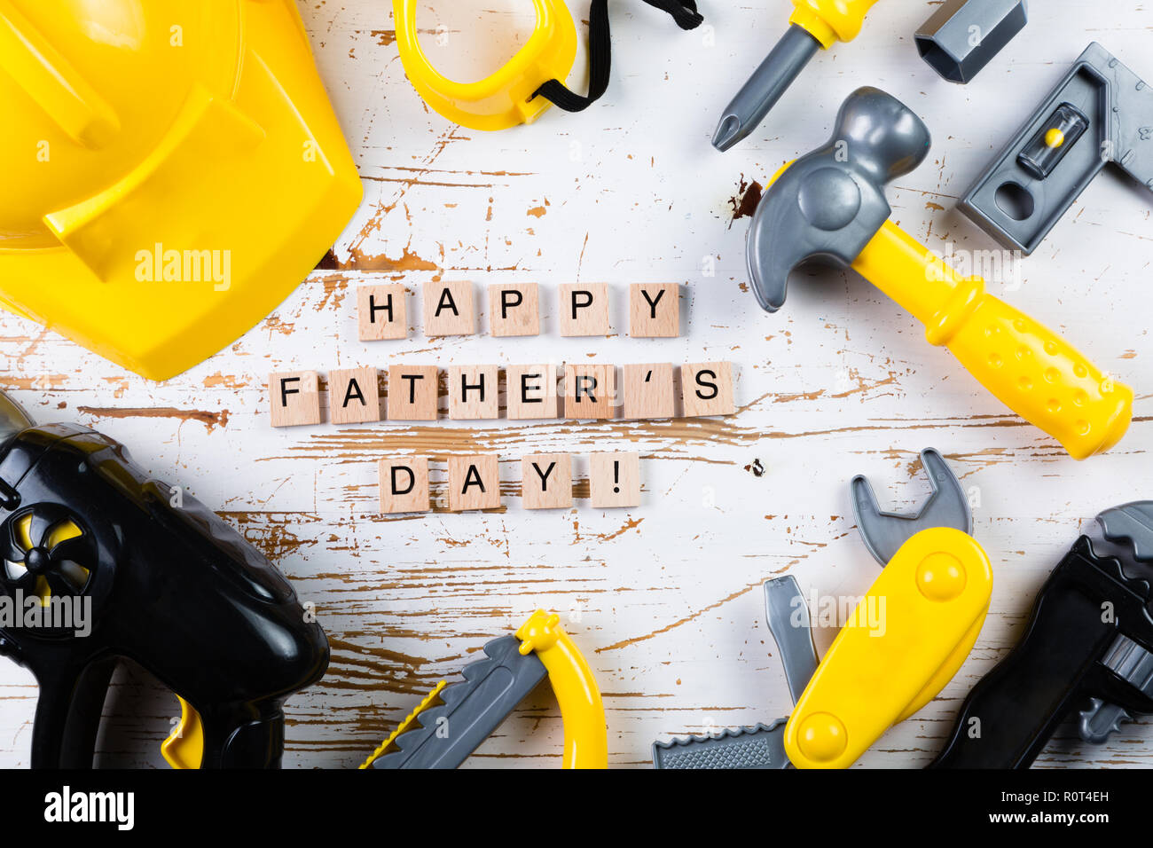 Father's day concept - child tools on wood background Stock Photo - Alamy