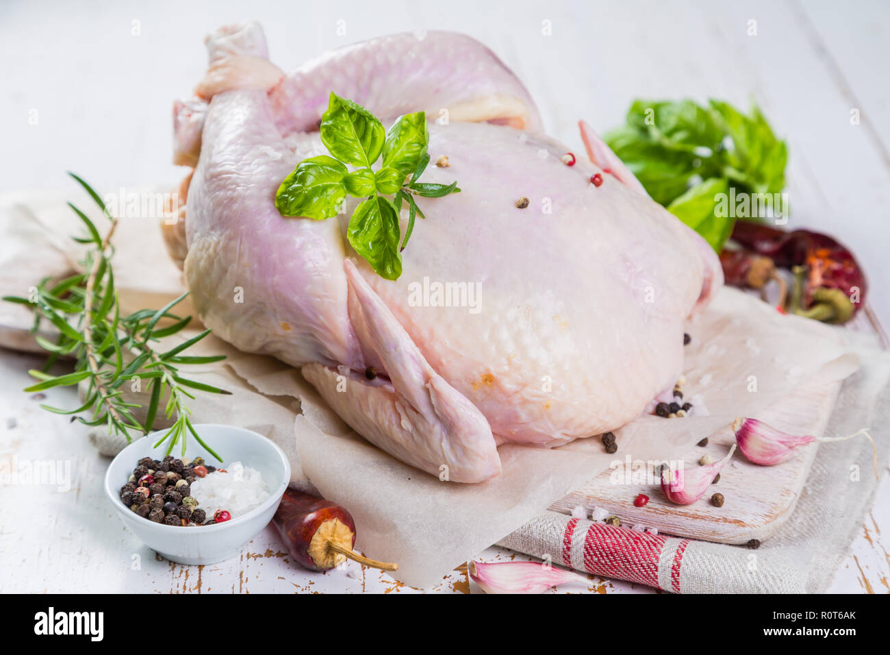 Raw whole chicken hi-res stock photography and images - Alamy