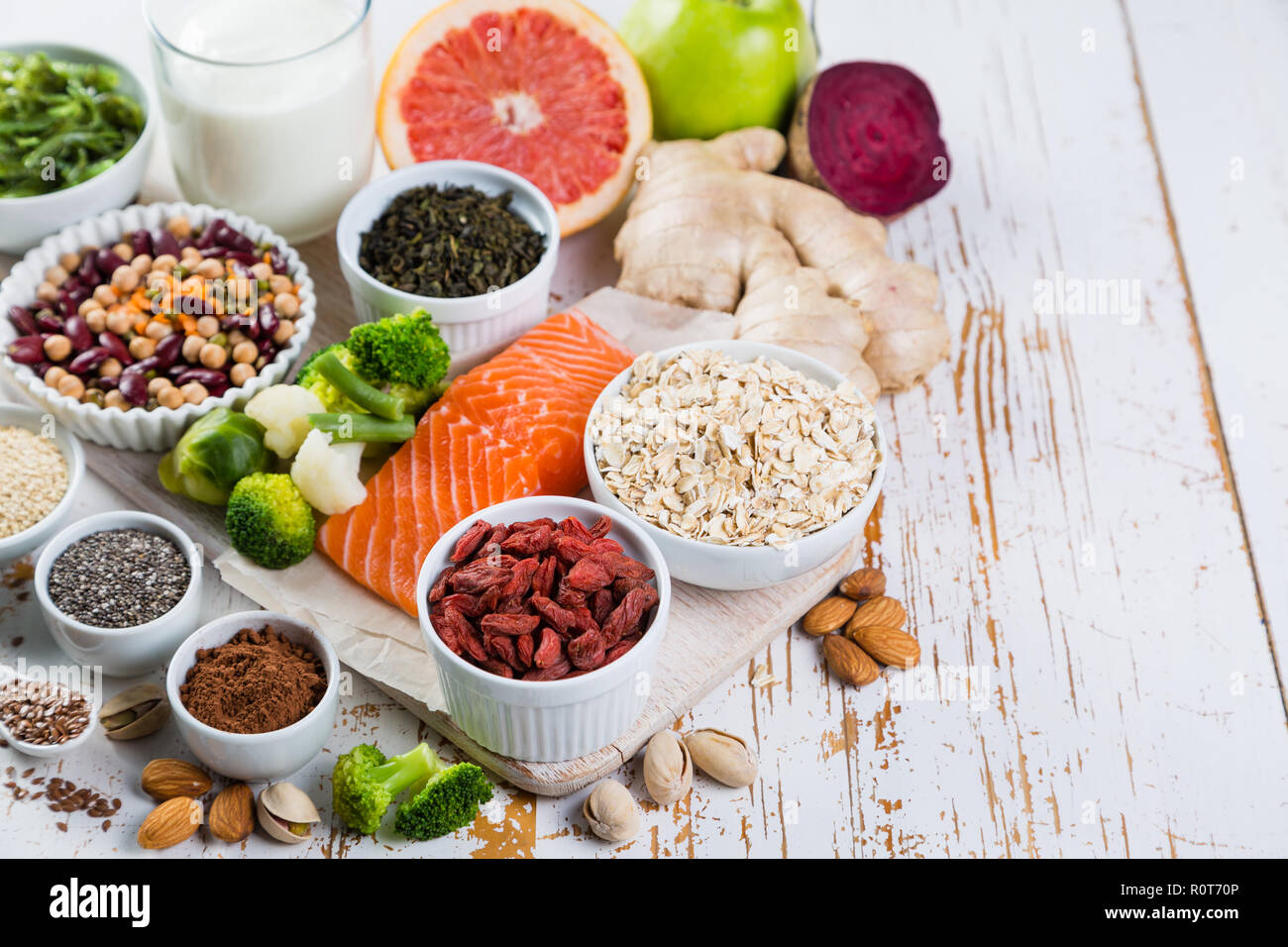 Selection of superfoods on rustic background Stock Photo - Alamy