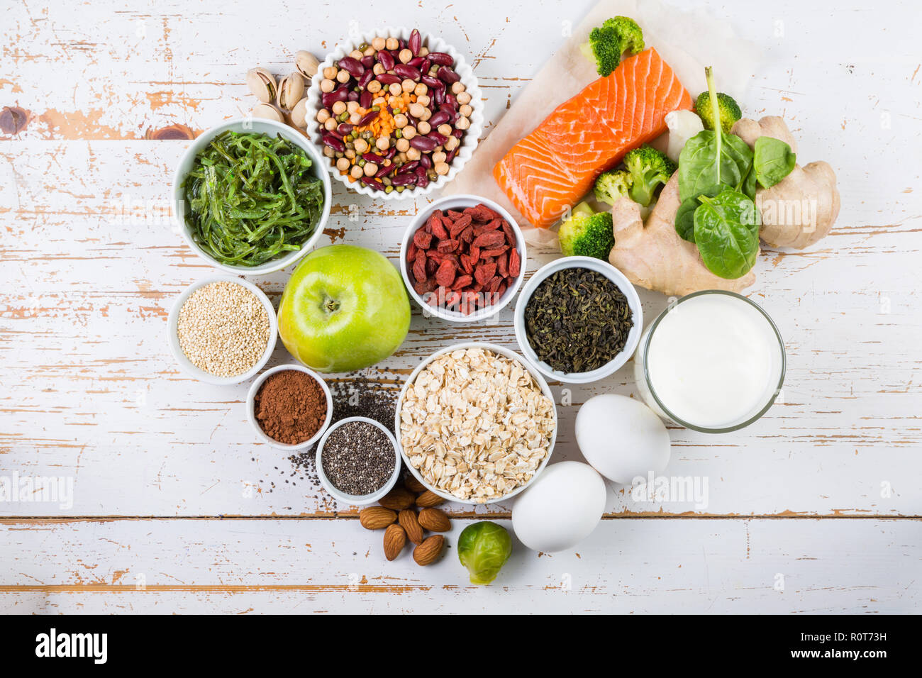 Selection of superfoods on rustic background Stock Photo - Alamy