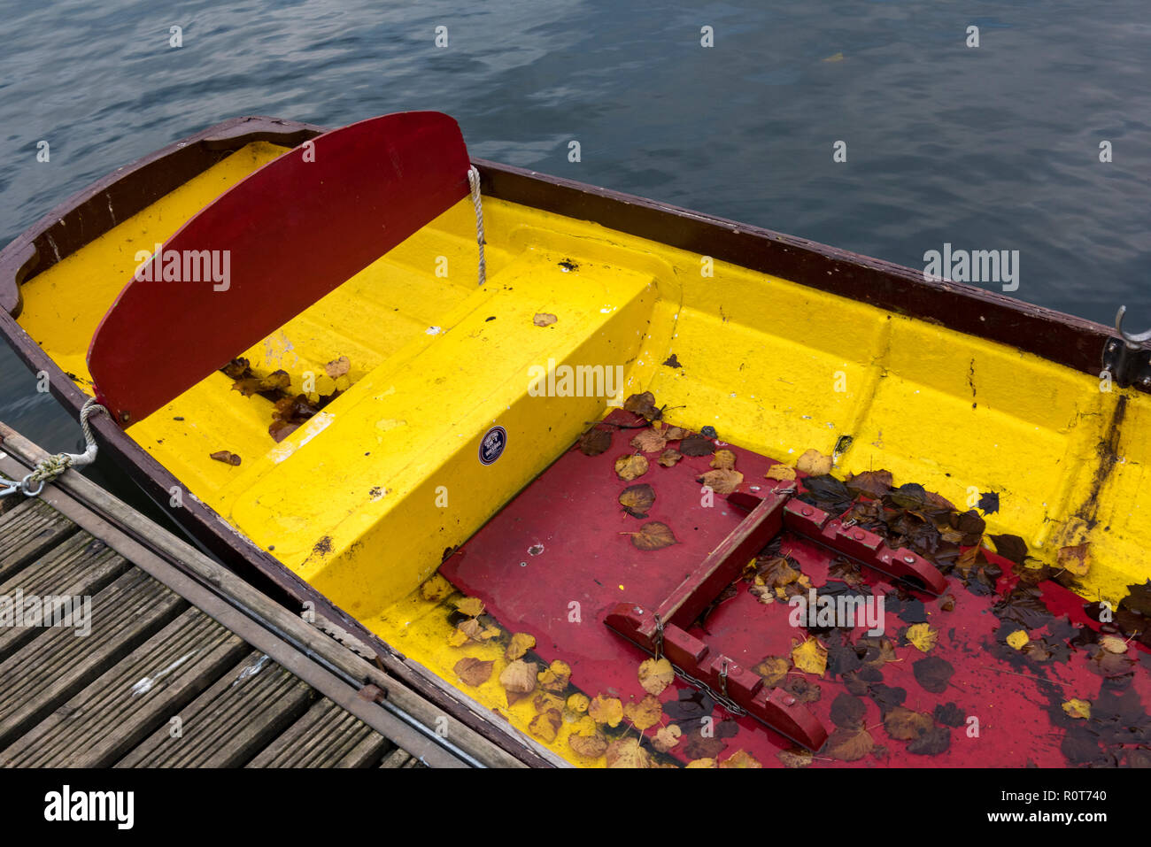 a colourful punt or pleasure rowing boat on the chichester ship canal ...