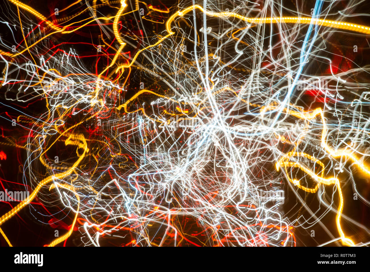 Slow shutter speeds creating abstract lighting trails of cars on the ...