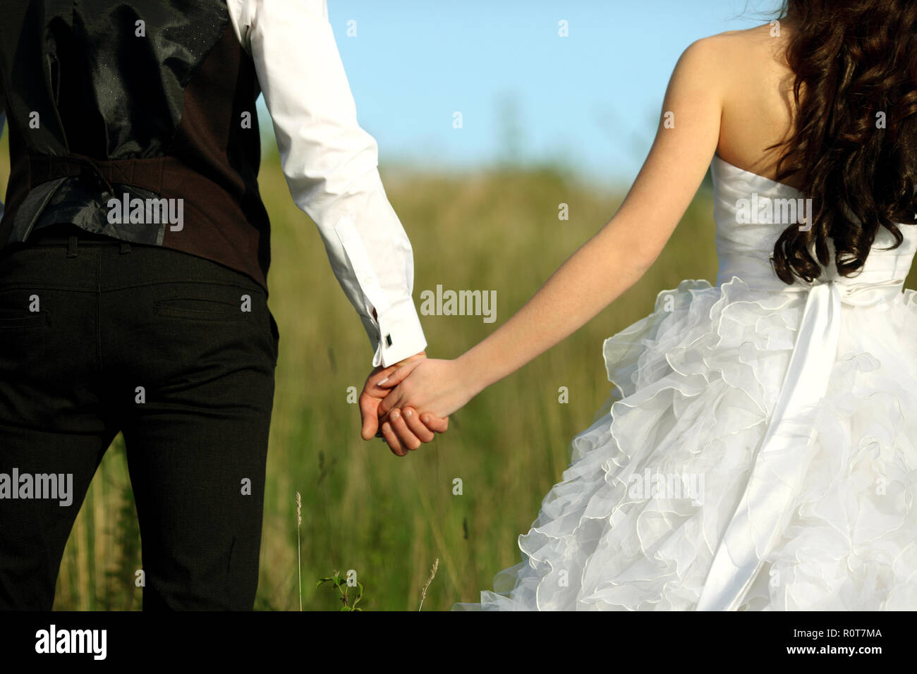 Bride and groom back view hi-res stock photography and images - Alamy