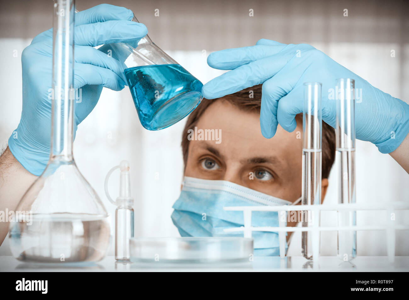 Laboratory scientist working at lab with test tubes Stock Photo - Alamy