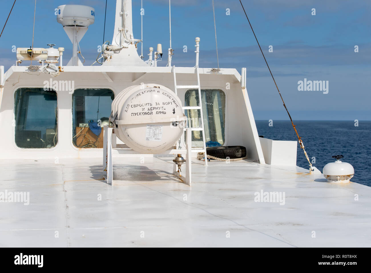 Life saving raft container on ship Stock Photo - Alamy