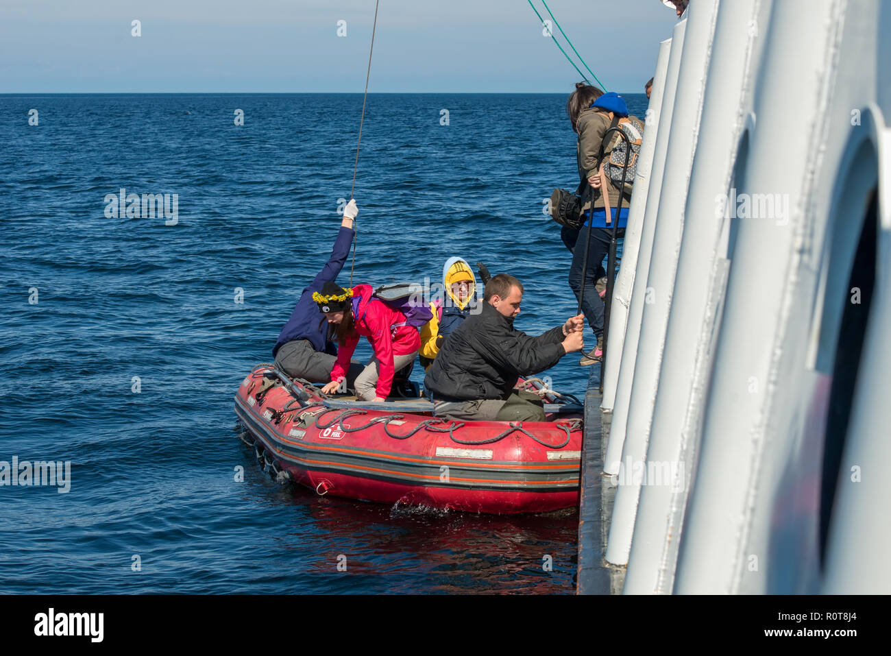 Girl on inflatable boat hi-res stock photography and images - Alamy