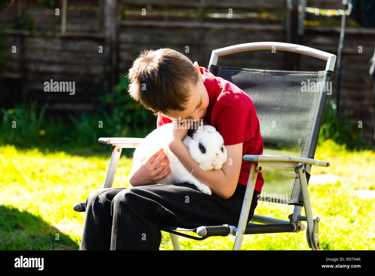 A handsome happy smiling little boy with autism, Aspergers syndrome and ...