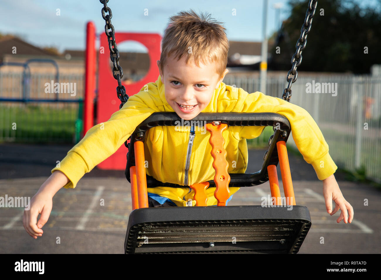 A handsome little boy with ADHD, Autism, Aspergers Syndrome plays ...