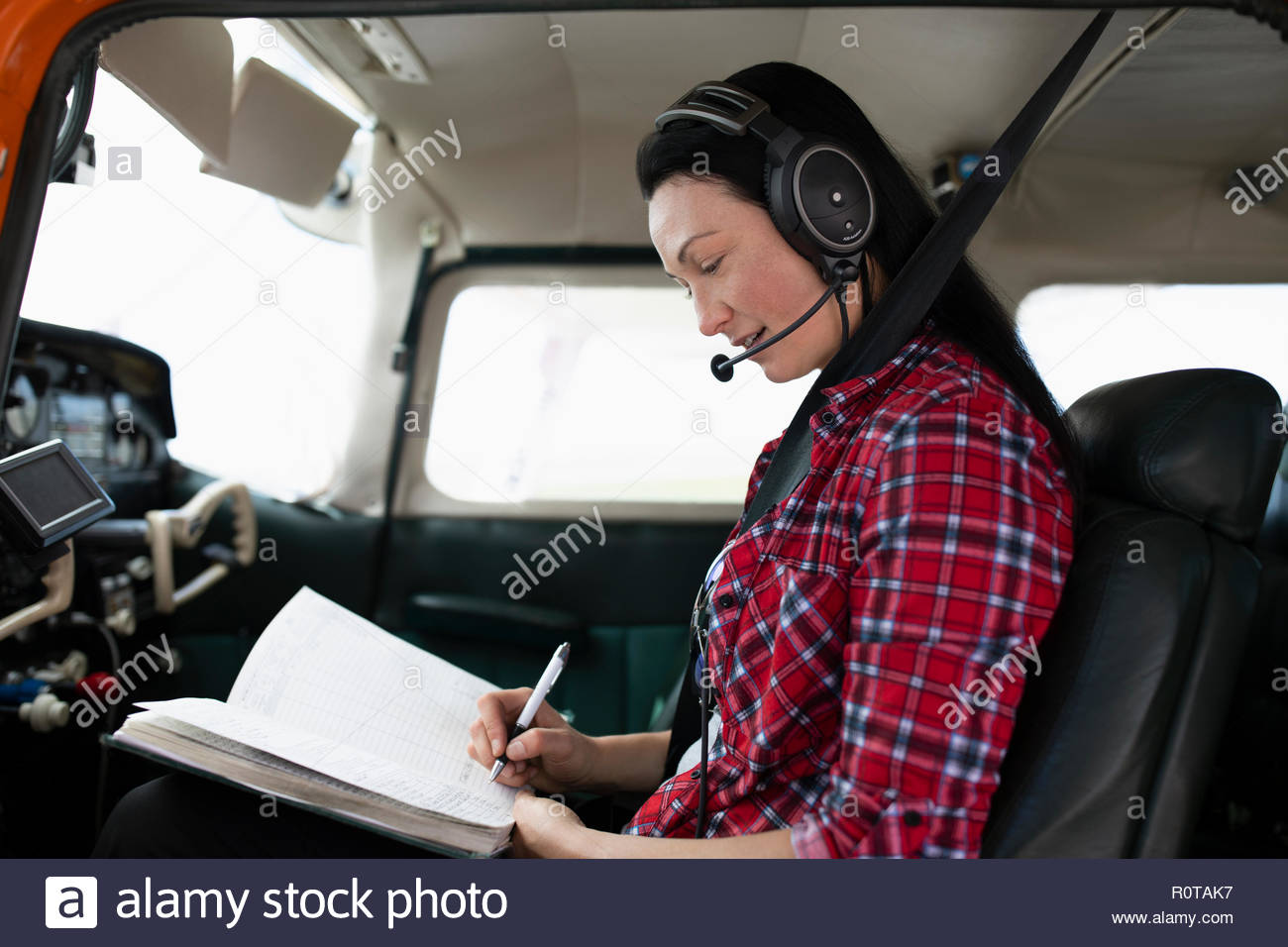 Smiling pilot cockpit hi-res stock photography and images - Alamy