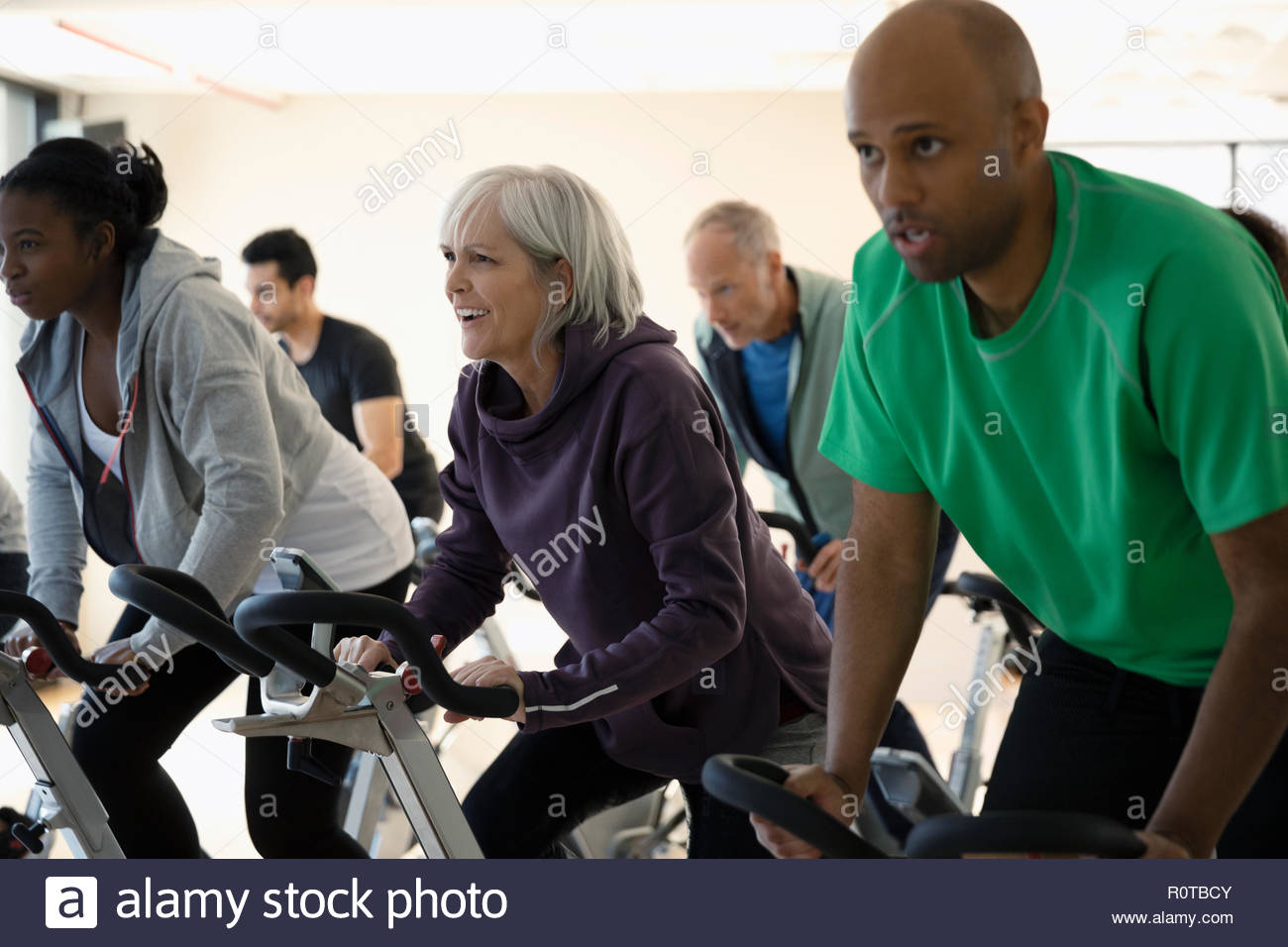 Three people riding a bicycle High Resolution Stock Photography and ...