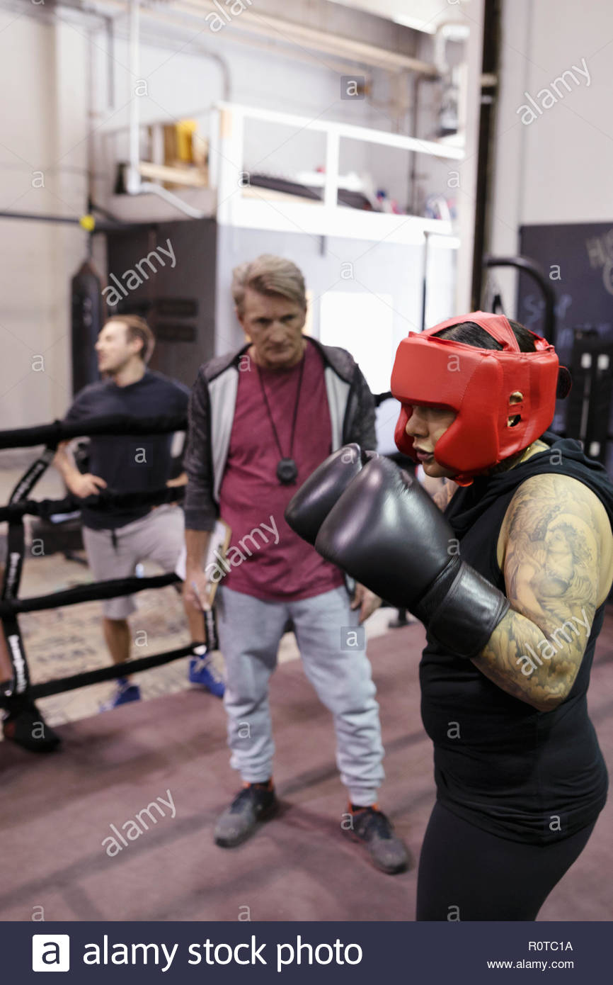 Boxer training coach in ring hi-res stock photography and images - Alamy