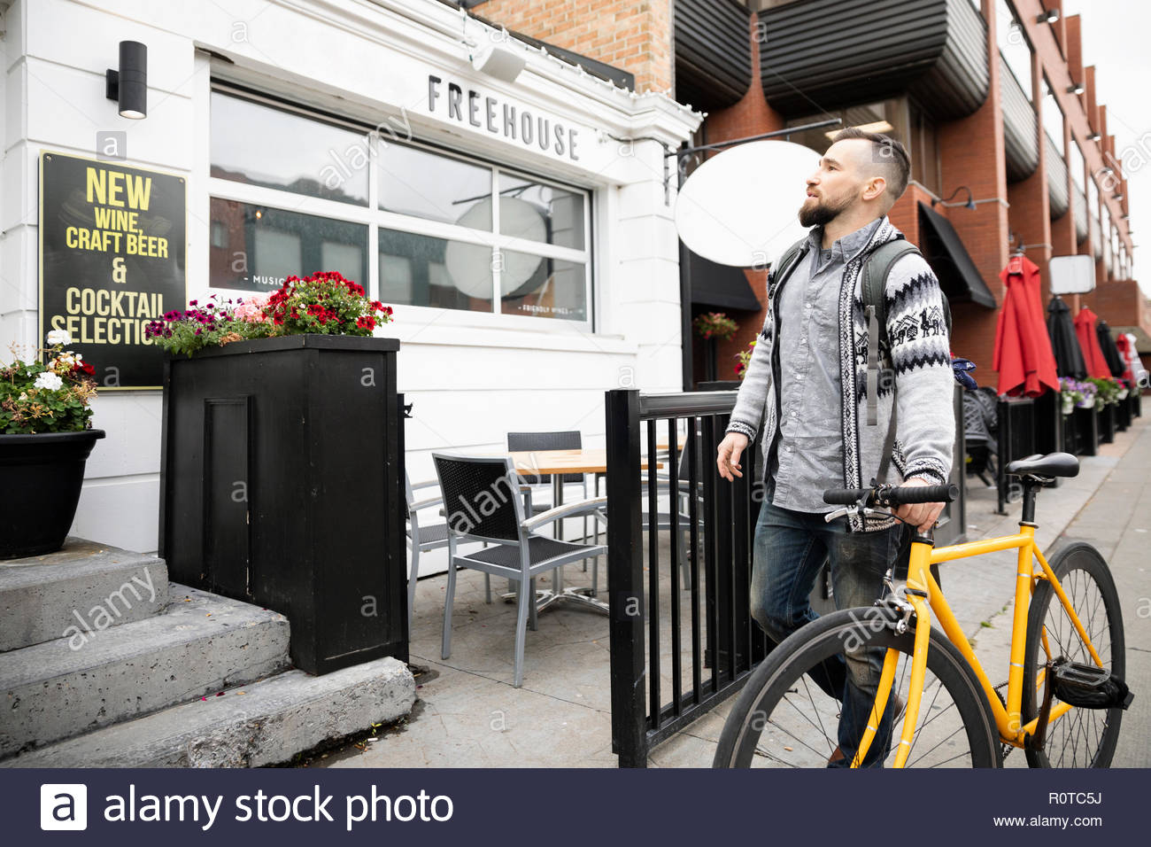 Man outside bar hi-res stock photography and images - Alamy