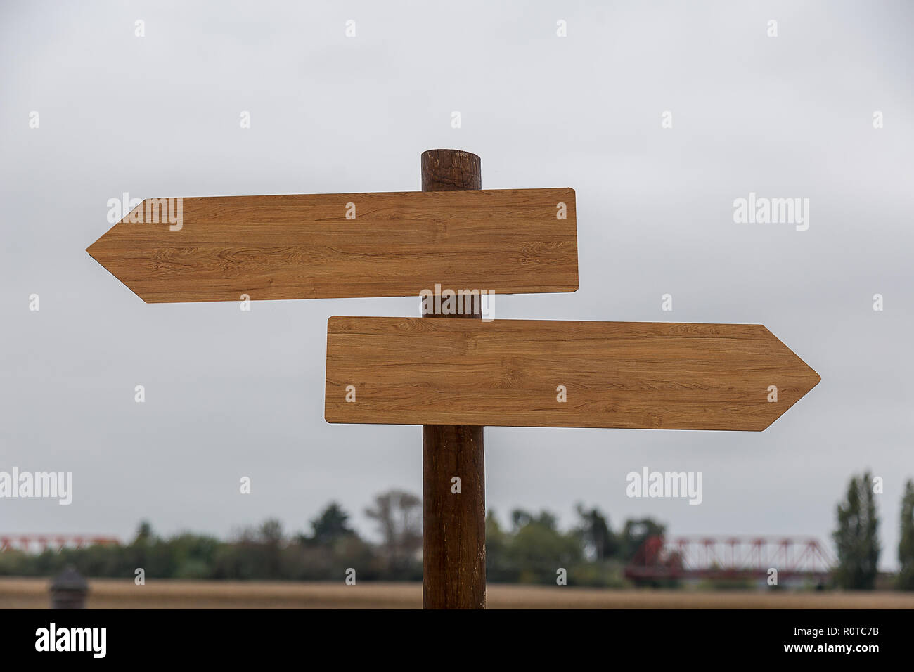 Wooden pole direction signs hi-res stock photography and images - Alamy